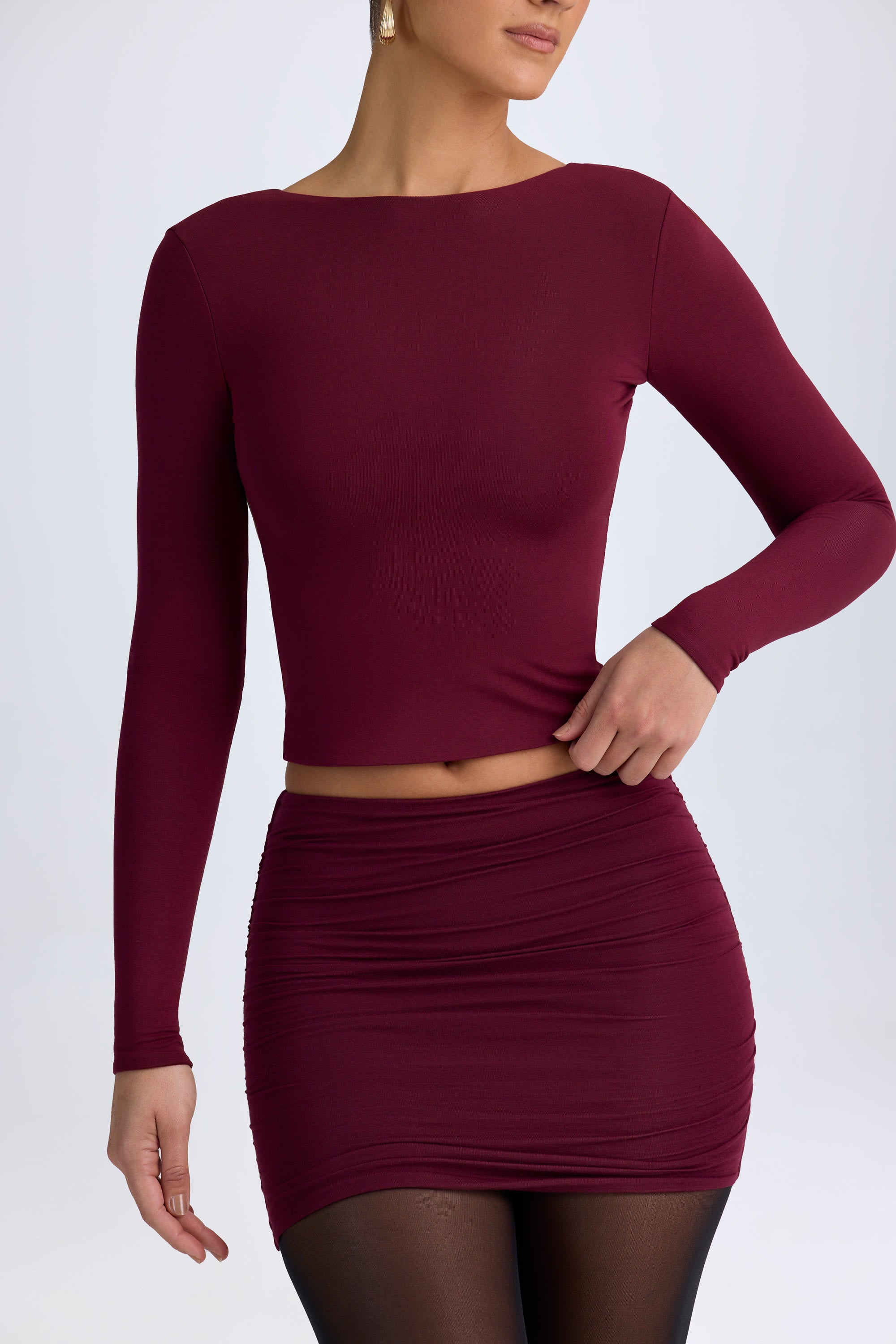 Cali Modal Ruched Mid-Rise Mini Skirt in Wine Red | Oh Polly